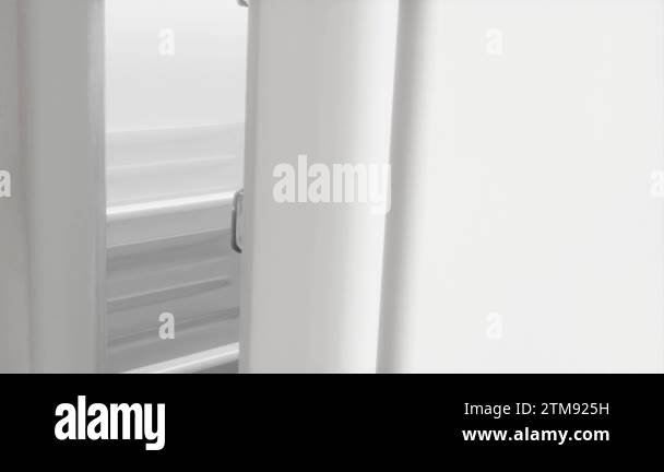 Opening and closing the door of fridge. Animation of an empty ...