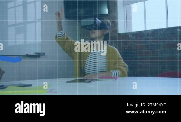 Animation of graphs over grid pattern over asian woman wearing vr ...