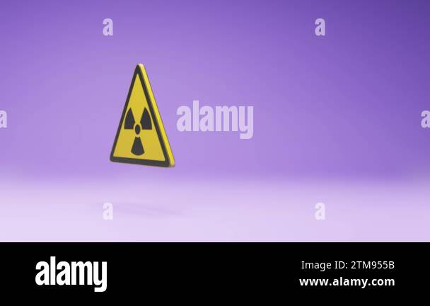 Radiation Hazard Symbol Spinning on a Studio Purple Background ...