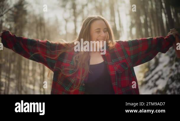 Female traveler finds inner peace in the beauty of nature, hiking through mountain ranges, and ...