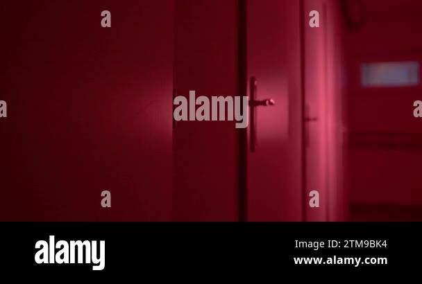 Police special operation basement room flashing blue and red light ...