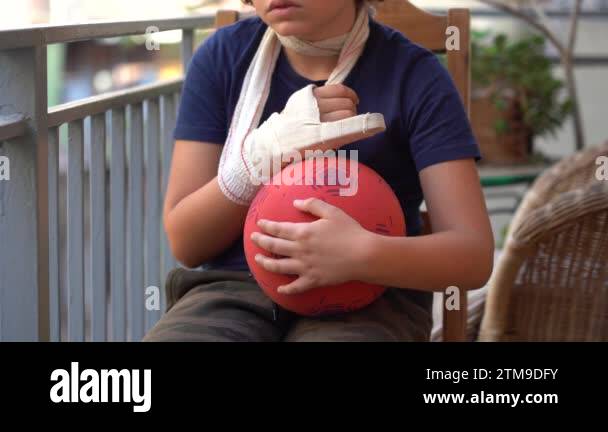 boy child 8 years old child breaks by fracturing the finger of his ...