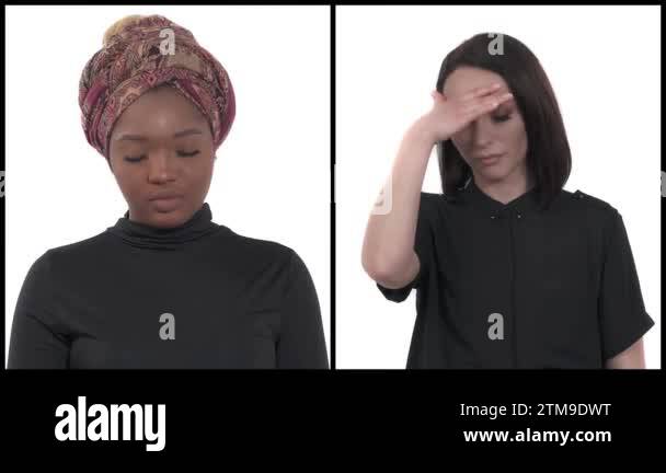 African and Caucasian millennial women touching their eyes with palms ...