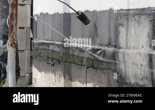 heating the insulation with an open fire. applying asphalt strips to ...