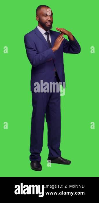 Vertical video: Side view of company worker showing timeout pause ...