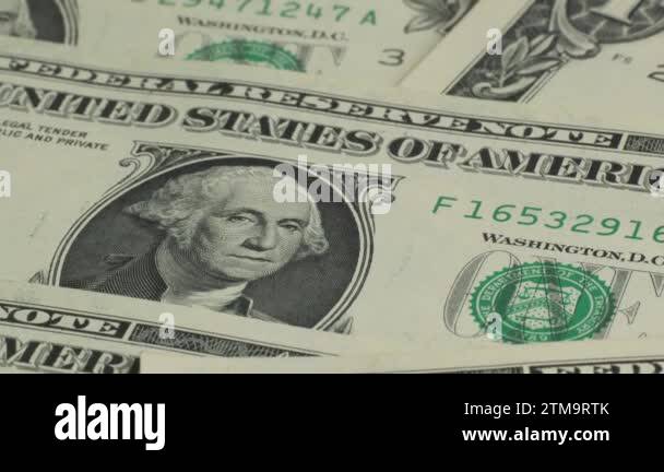 American one dollar paper money pile on desk. US Dollar bills one ...