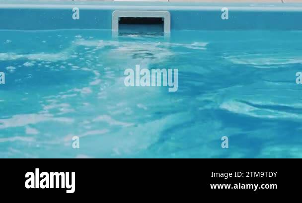 The countercurrent in the pool is a powerful flow of water. A swimmer ...