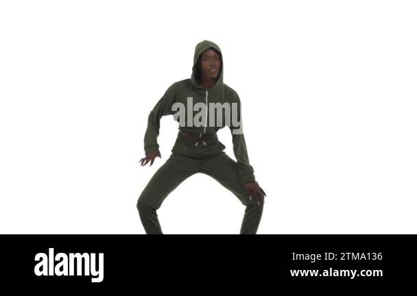 Front view of African woman wearing in hood and dancing. Dancer ...