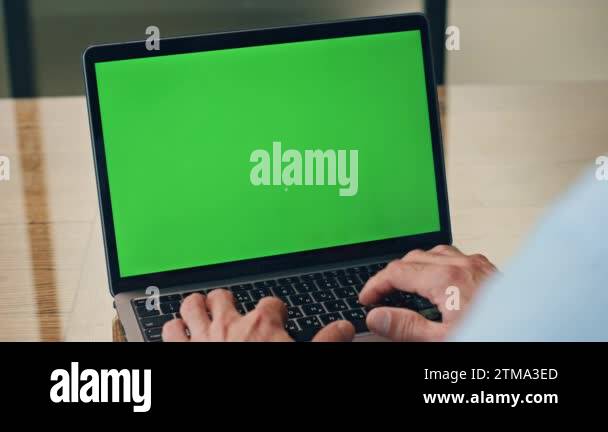 Man hands typing chromakey laptop at workplace closeup. Unknown ...