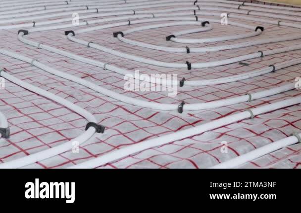 Installation of underfloor heating pipes for water heating. Heating ...