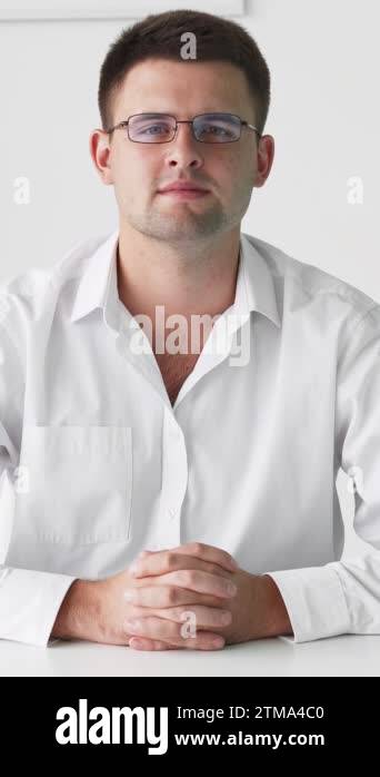 Vertical video. Online meeting. Office man. Virtual interview. Positive ...
