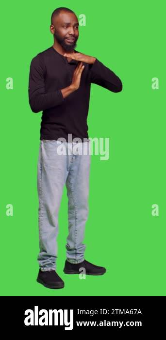 Vertical video: Side view of young model showing timeout symbol in ...