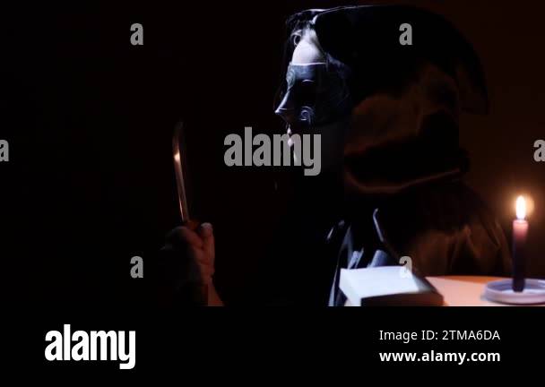 Dark ritual and satanic prayer performing by devil worshipper girl. 4K ...