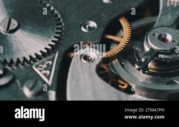 Clock mechanism rotates close-up. The working mechanism of round ...