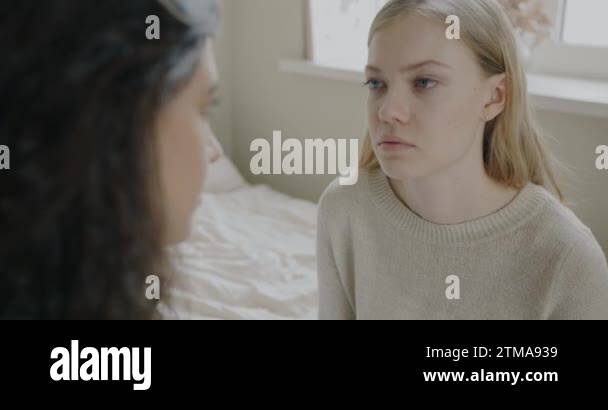 Unhappy young woman talking to friend sharing bad news getting support ...