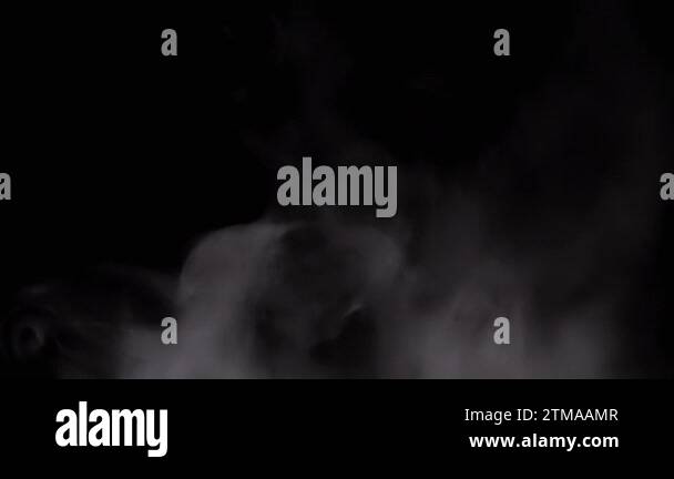 Rising Blurred White Clouds of Steam, Smoke, Icy Thick Fog on a Black ...