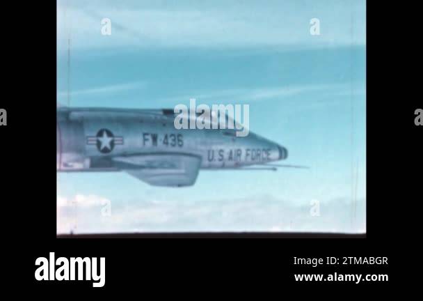 Clos-up view of USAF fighter jet of 1950s in flight. Side view from ...