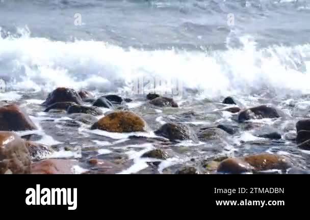 Powerful sea waves break on the coast of the Red Sea. Waves crash on a ...