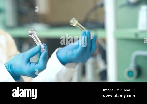 Female scientist mixing chemical solution Stock Videos & Footage - HD ...