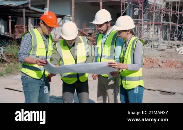 Team group of contractor and architect with foreman explaining about ...