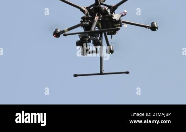 drone hexacopter flying sky Stock Video Footage - Alamy