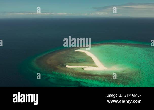 Beautiful beach on tropical island surrounded by coral reef, sandy bar ...