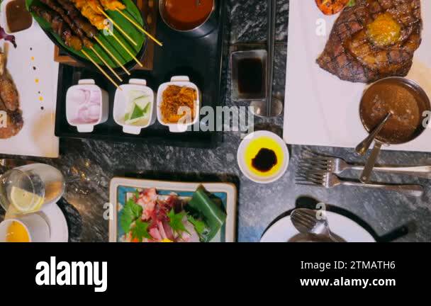 Fine food dining in luxury restaurant. Table full of various food ...
