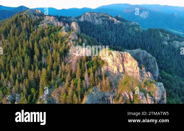 High rocky wild mountain range of Rhodope Mountains covered with green ...