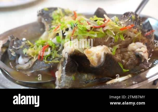 Fresh steamed whole fish Stock Videos & Footage - HD and 4K Video Clips ...