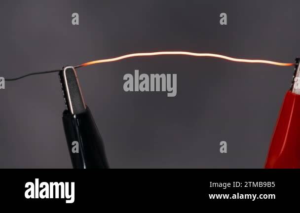 Nichrome wire heated to red under high current strength. Nichrome ...