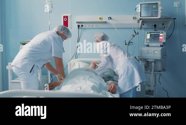 woman man doctors rush to help sick patient in modern clinic treatment ...