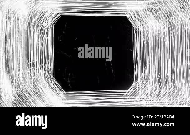 Square retro frame with white scratches on a black screen. The effect ...