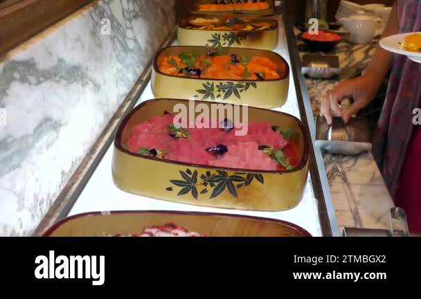 Seafood buffet in luxury restaurant. Customers choose a fresh food from ...