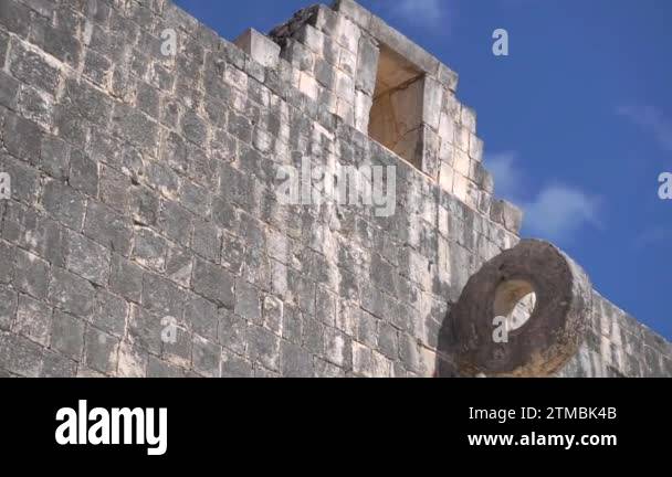 A stone Rind on a wall of Ancient field for Mayan Ball Game in Chichen ...