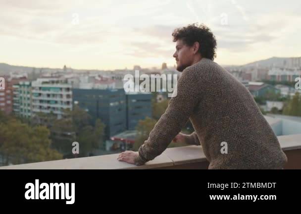 Man stands on balcony Stock Videos & Footage - HD and 4K Video Clips ...