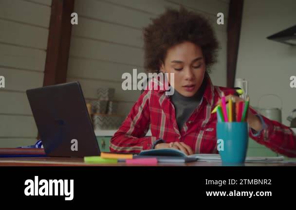 Smart beautiful African American female university student studying and ...