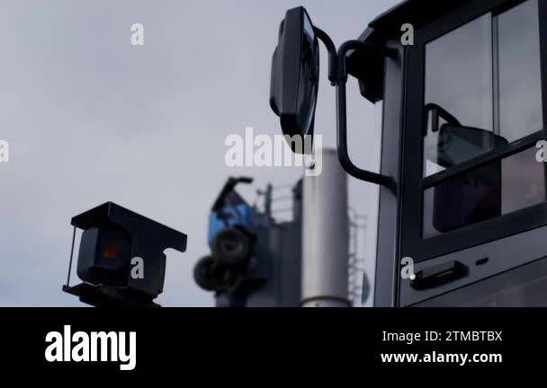 Modern tractor cabin on construction site against evening sky. Process ...