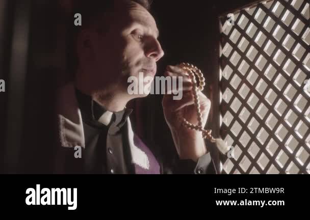 Catholic priest confession black white Stock Videos & Footage - HD and ...