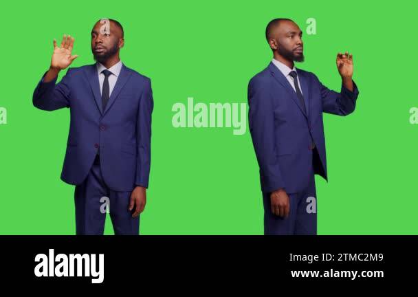 Company manager examining 3d holographic image in studio, working with ...