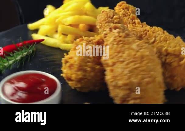 Chicken leg fries Stock Videos & Footage - HD and 4K Video Clips - Alamy