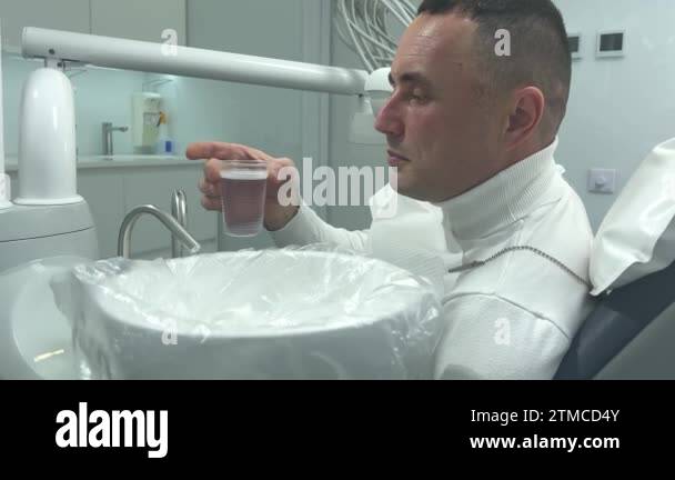 rinsing mouth after dentist procedures from spitting into special ...