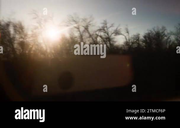 Bullet train rides on the railway track during a beautiful sunset ...