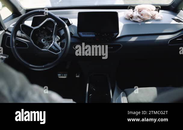 Car interior after an accident with airbags deployed. View from inside ...