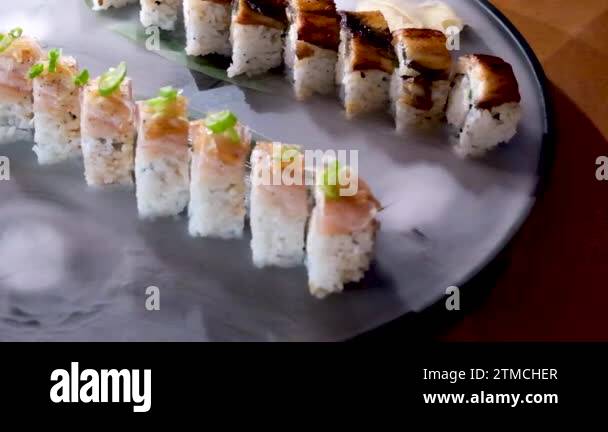 Sushi is a Japanese dish of prepared vinegared rice sushi-meshi ...