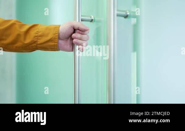 Man opening the door of a building Stock Videos & Footage - HD and 4K ...