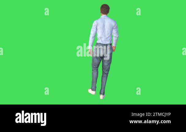 3d Animation of a male actor on a green screen walking from the back in ...