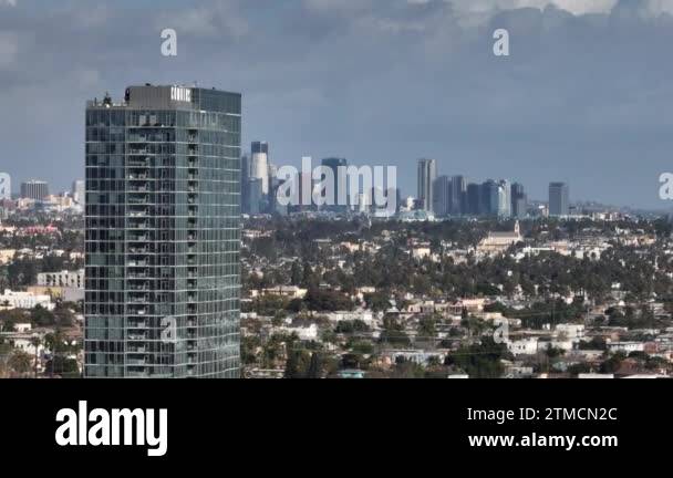 Aerial slide and pan shot of modern high rise office towers in ...