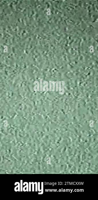 Vertical video. Glitch grain. Old film static noise. Green black real ...