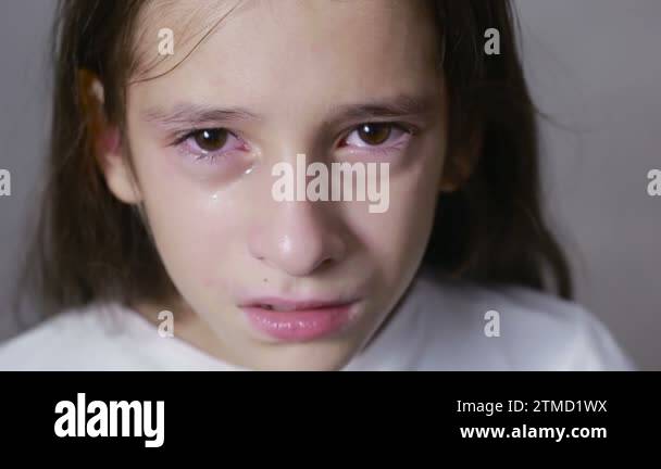 little girl crying with tears rolling down her cheeks Stock Video Footage - Alamy