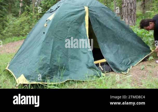 Camping man tent Stock Videos & Footage - HD and 4K Video Clips - Alamy